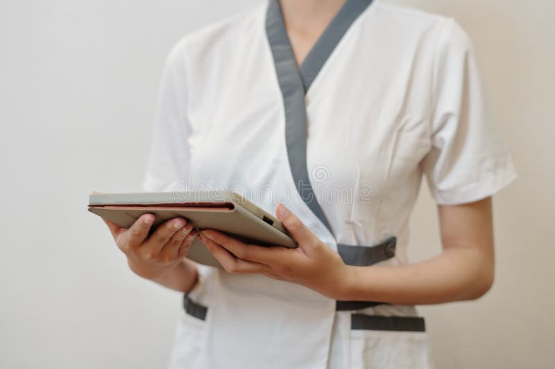 Receptionist Checking Schedule Stock Photo - Image of personnel, staff ...
