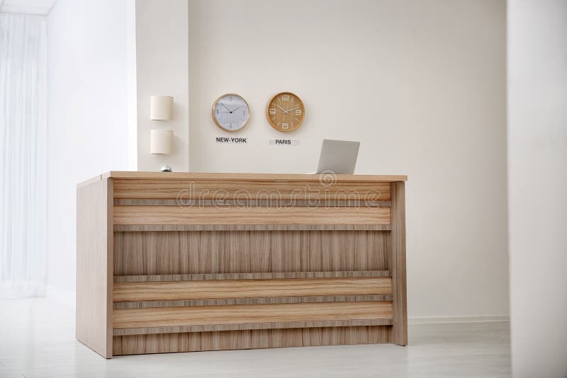 Receptionist desk in hotel stock photo. Image of customer - 123860948