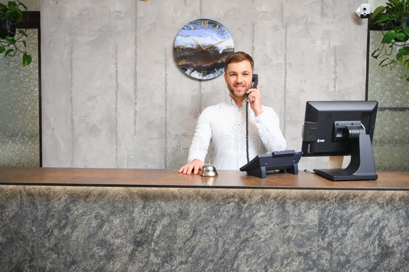 Receptionist at Desk in Lobby Stock Image - Image of concierge, modern: 335019957