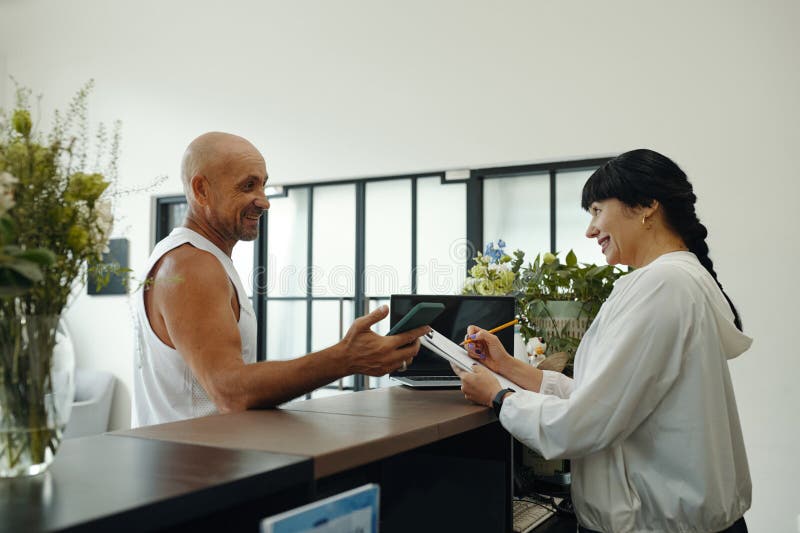 Receptionist at work stock image. Image of working, mobile - 140543665