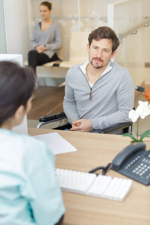 Receptionist and Doctor with Client in Hospital Stock Photo - Image of ...