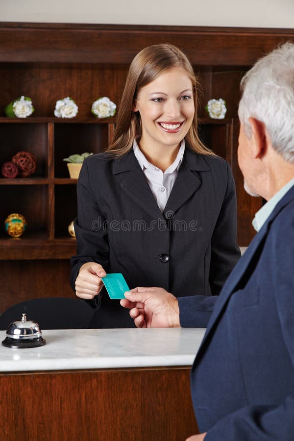 Receptionist Behind Counter at Hotel Stock Image - Image of caucasian ...