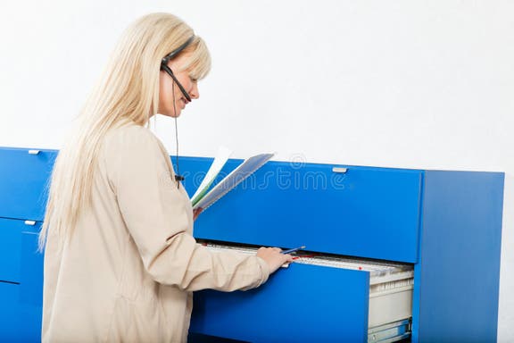 Receptionist with Medical Records Stock Image - Image of paperwork ...
