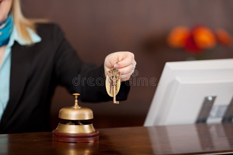 Receptionist Passing Room Keys Stock Photo - Image of front, occupation ...