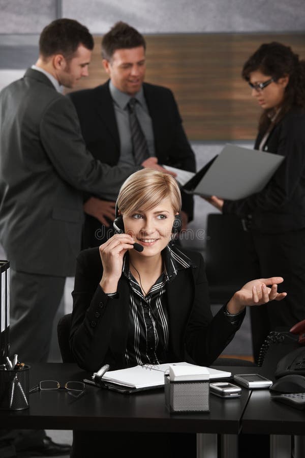 Receptionist Receiving Phone Calls Stock Image - Image of businesswomen ...