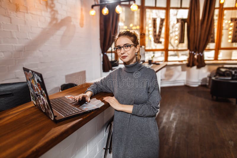 Receptionist Standing at Reception Counter in Office Stock Image ...
