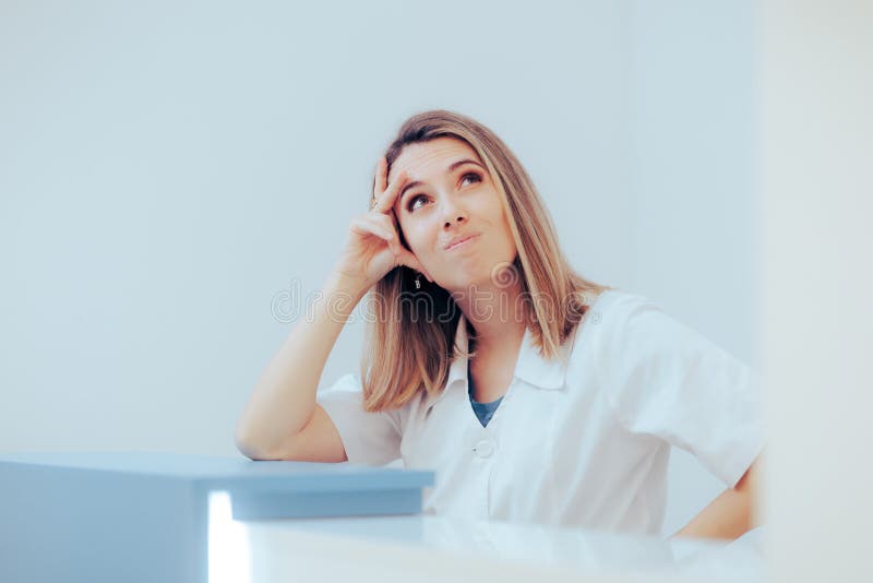 Receptionist Standing at the Reception Desk Thinking Feeling Stressed ...