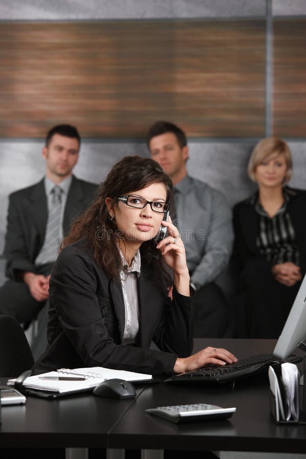 Receptionist Talking On Phone Stock Photo - Image of desk, corporation ...