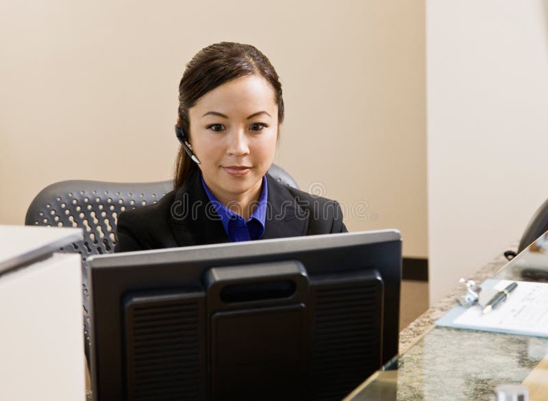 Receptionist with Telephone Earpiece Stock Image - Image of woman, head ...
