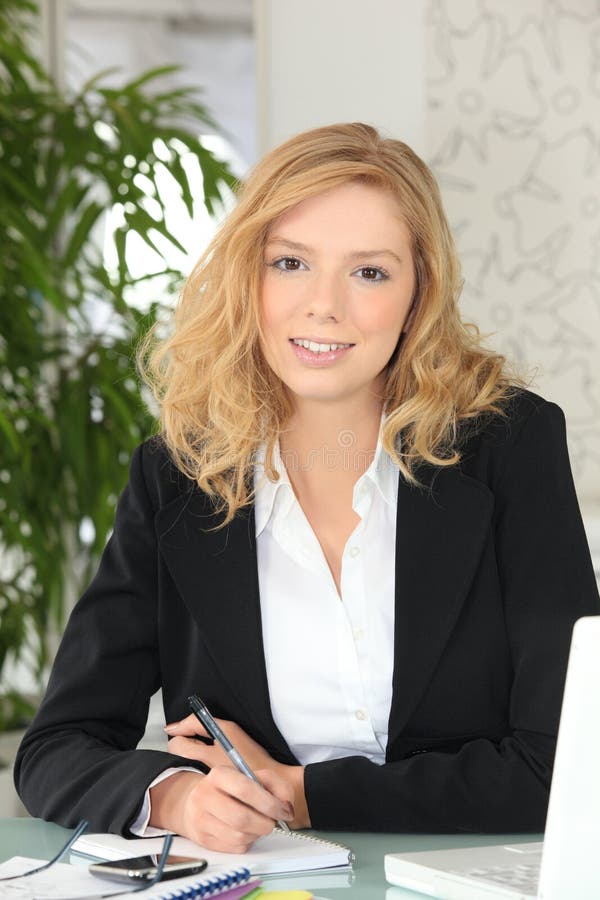 Businesswoman Writing In Diary Stock Photo - Image of wearing, closeup ...