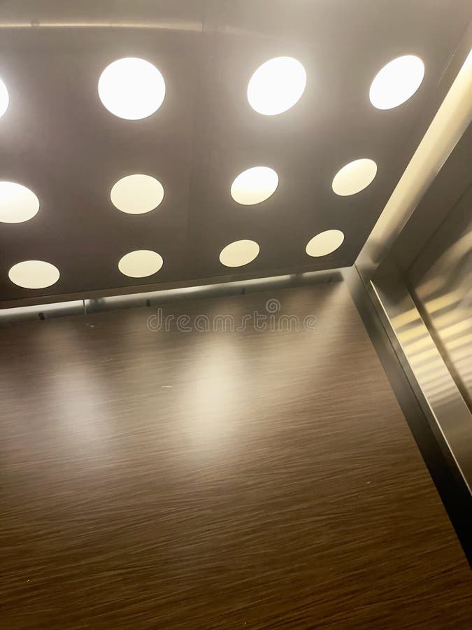 Recessed Lighting and the Door of an Elevator Stock Photo - Image of ...