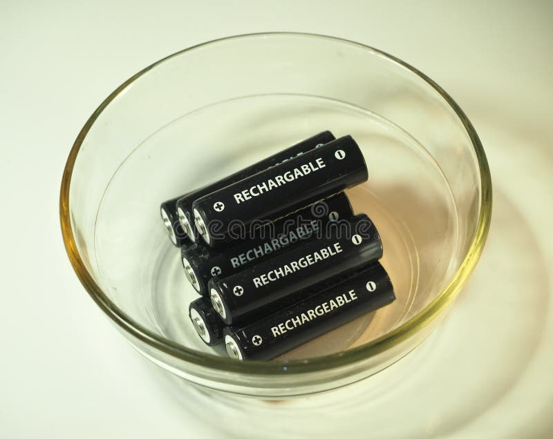 Rechargeable Aa Batteries in a Glass Container. Stock Image - Image of ...