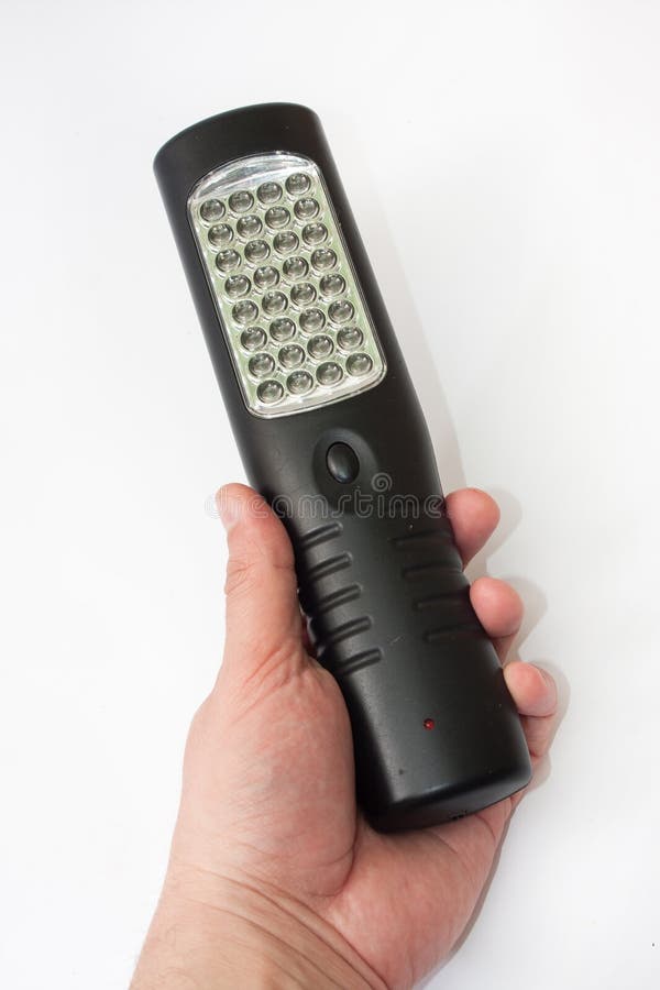 Rechargeable LED Lamp in Hand Stock Photo - Image of front, high: 50342004