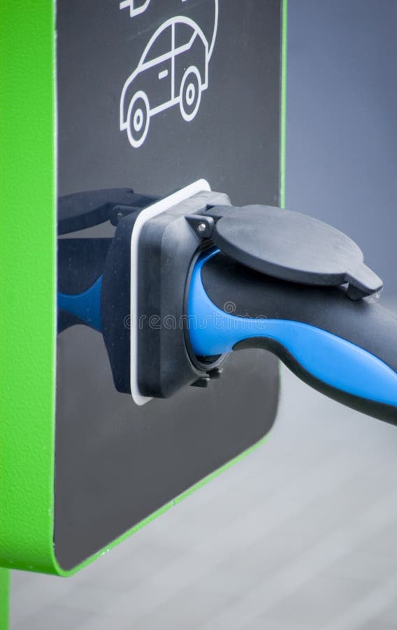 Recharging Electric Car by Power Cable. Stock Image - Image of ... Recharging Electric Car by Power Cable. Stock Image - Image of ...