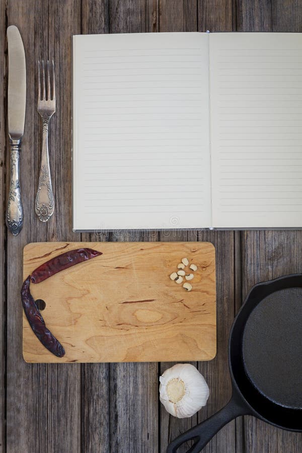 Recipe Book with a Mix of Kitchen Objects on a Vintage Wood Back Stock ...