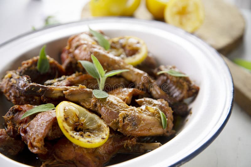 Fried Rabbit Cooked with Young Garlic and Sage. Typical Spanish Tapa ...