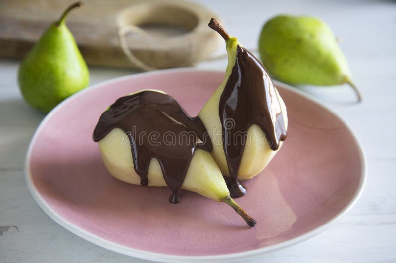 Pears with Melted Chocolate on Top. Stock Photo - Image of liquid ...