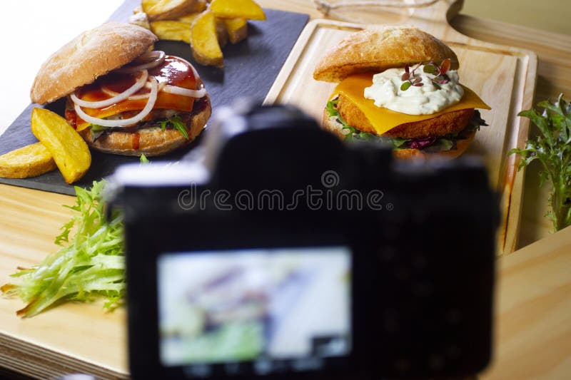 A Person is Using a Camera To Take a Picture of Food and Beverage on a ...