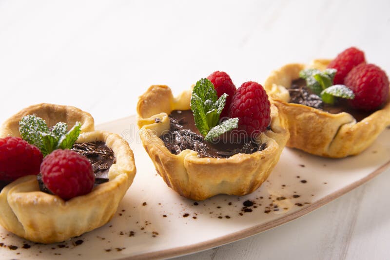 Raspberry Tarts on a Plate with Raspberries Stock Photo - Image of cake ...
