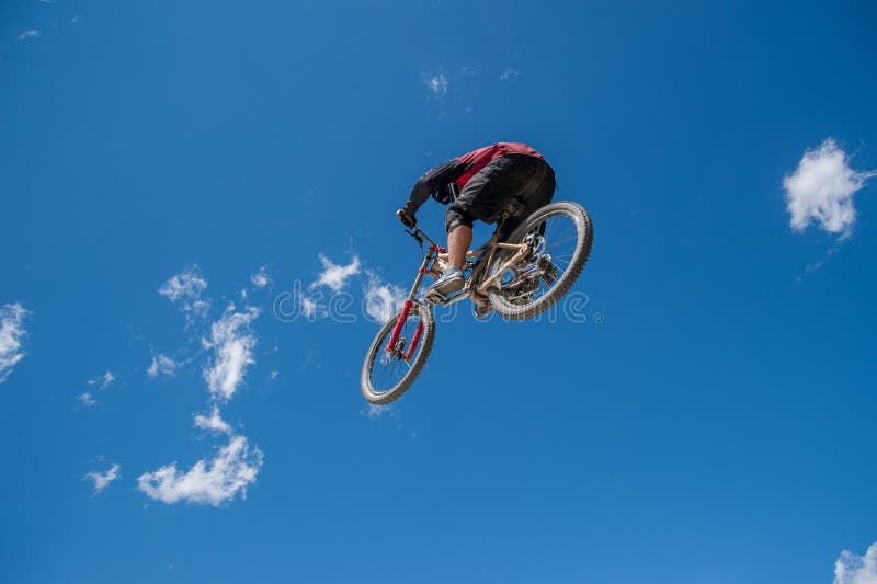 Jump bike stock photo. Image of bike, jump, abigliamento - 111785568