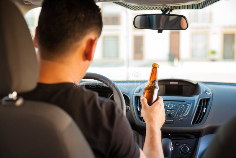 Reckless Driver Drinking Beer Stock Image - Image of automobile, copy ...