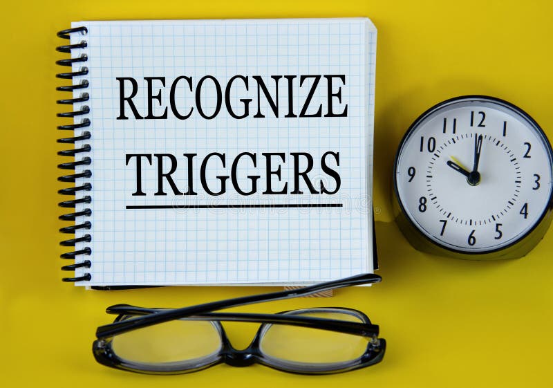 RECOGNIZE TRIGGERS - Words in a White Notebook with Alarm Clock and ...
