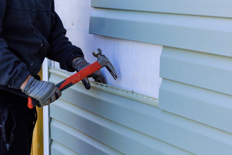 When Reconstructing Exterior of a House, Damaged Plastic Siding is ...