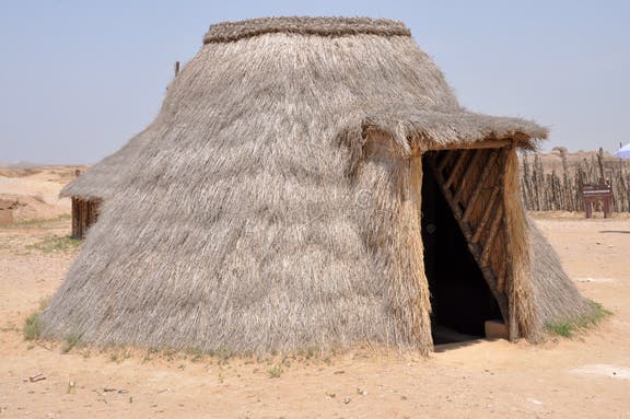 Reconstruction of Neolithic House Stock Photo - Image of fire, leather ...