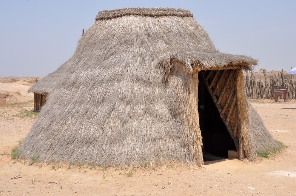 Reconstruction of Neolithic House Stock Photo - Image of fire, leather ...