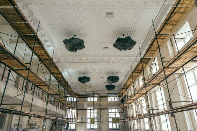 Reconstruction Work. Repairing an Old Building. Building Scaffolding ...