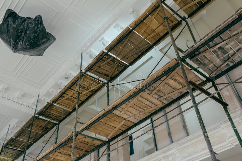 Reconstruction Work. Repairing an Old Building. Building Scaffolding ...
