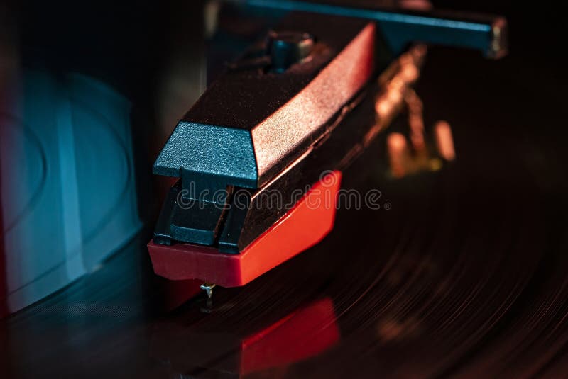 Record Player Needle Playing Vinyl Record with Red Light Stock ...