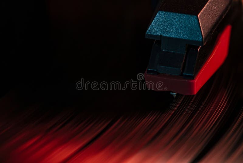 Record Player Needle Reading Vinyl Record in Red Light Stock ...