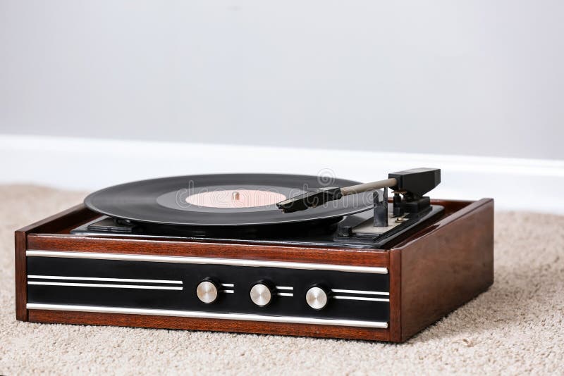 Record Player with Vinyl Disc on Floor in Room Stock Photo - Image of ...