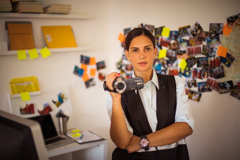 Recording. FBI Female Agent Using Camera. Focus is on Hand Stock Image ...