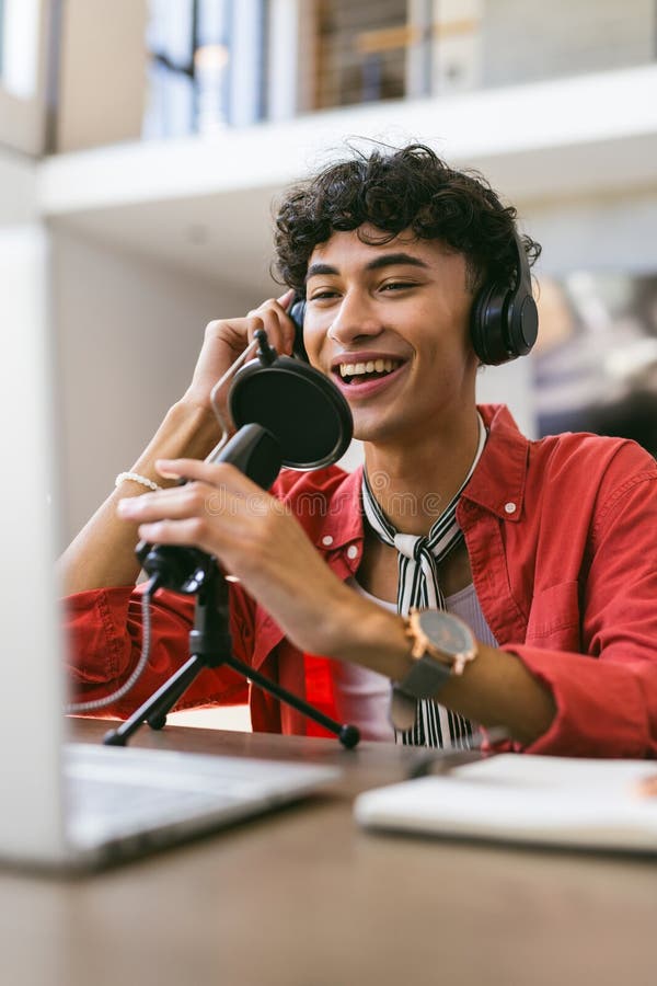 Recording Podcast, Smiling Young Man Using Microphone and Laptop at ...
