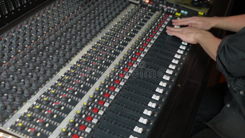 Producer Turning Knobs on Soundboard Stock Video - Video of entertain ...