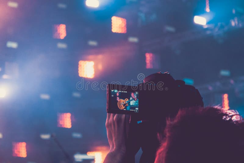 Recording To the Camera from a Tripod from a Concert Platform Stock ...