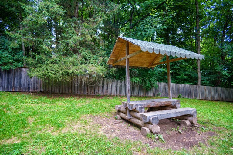 Recreation Area in a Forest, Gazebo with a Bench and Table in the ...