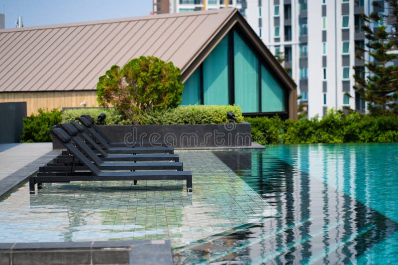 Recreation Area with Swimming Pool in a Modern Condominium Residential ...