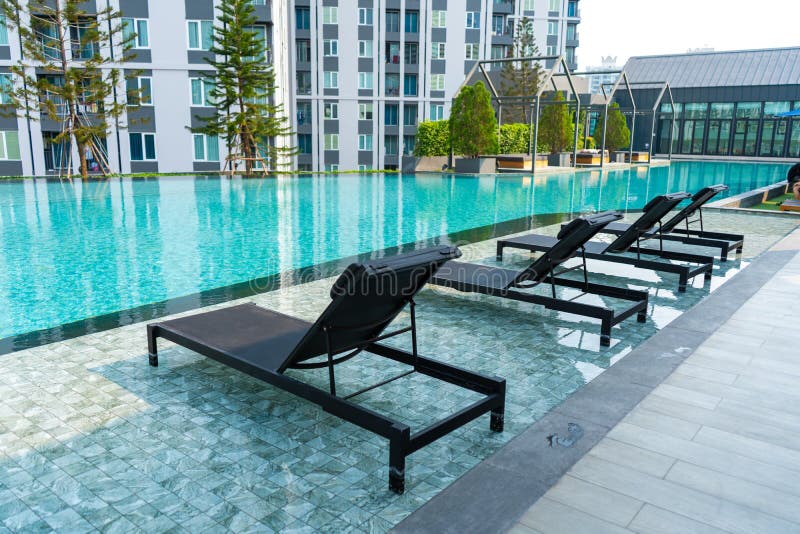 Recreation Area with Swimming Pool in a Modern Condominium Residential ...