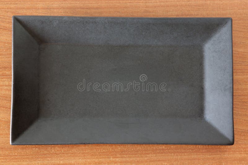 Rectangle Black Plate on the Table Stock Image - Image of rectangle ...