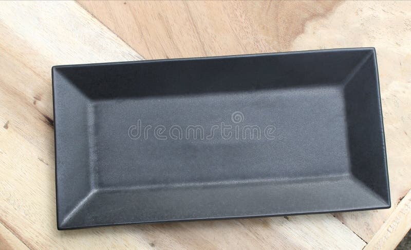 A Rectangle Plate on the Table Stock Photo - Image of flat, decking ...