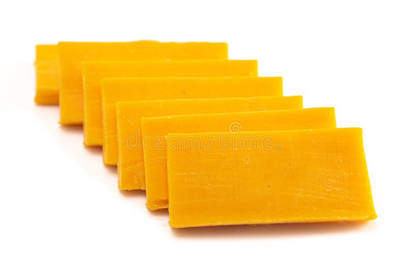 Rectangle Slices of Sharp Cheddar Cheese on a White Background Stock ...