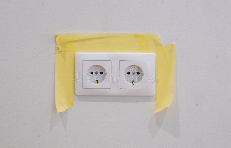 Rectangle Wall Socket Taped To Wall with Yellow Tape Stock Image ...