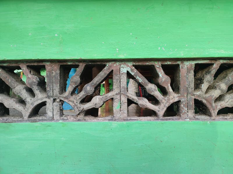 Gray Cement Block Air Ventilation Pattern with Green Wall Stock Image ...
