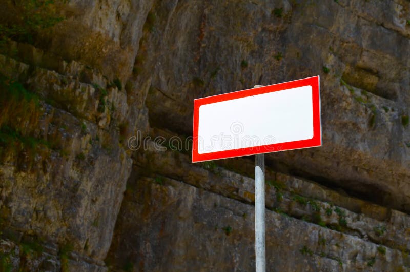 Rectangular Warning Sign in the Mountains. Mockup Stock Image - Image ...
