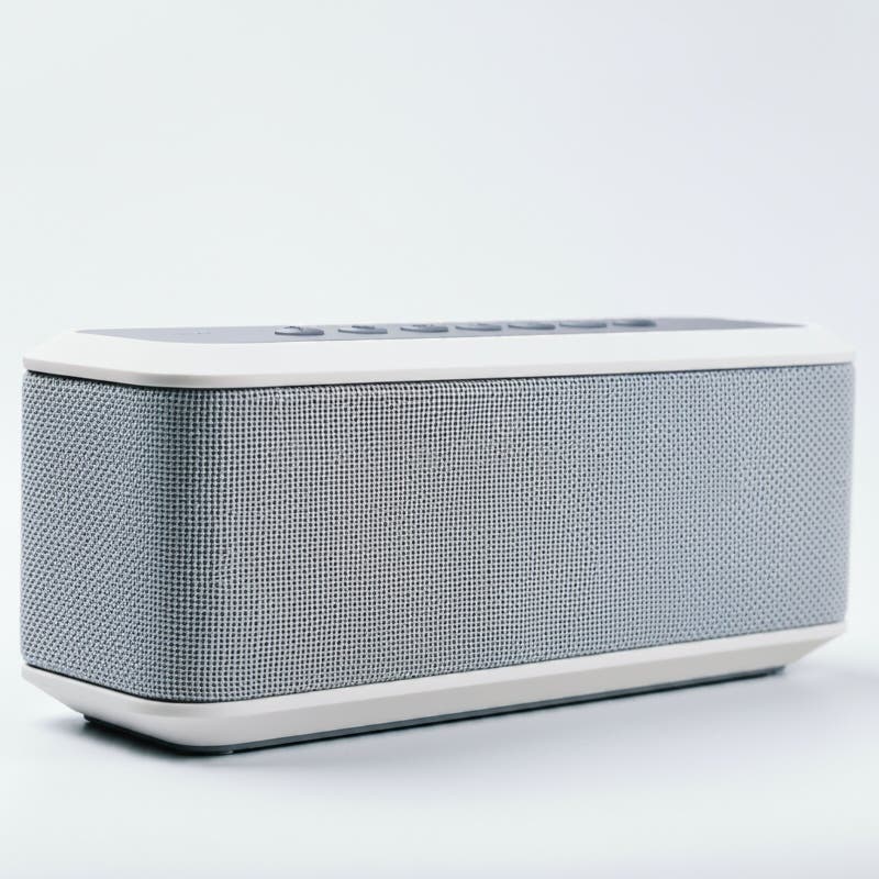 Rectangular Bluetooth Speaker with a Minimalist Design. it Features a ...