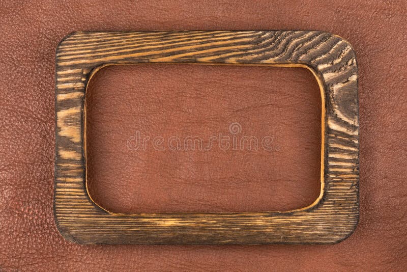 Rectangular Frame Made from Light Wood Lies on Brown Natural Leather ...