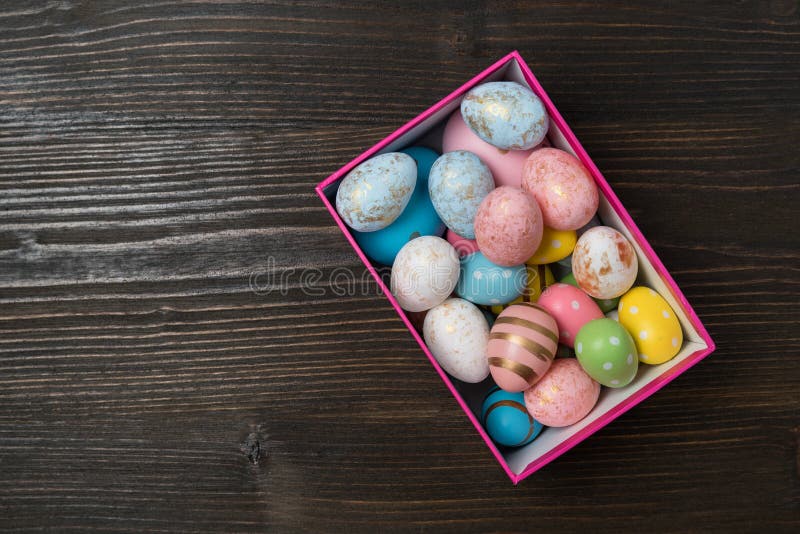 Rectangular Box with Bright Multi-colored Easter Eggs on Wooden ...